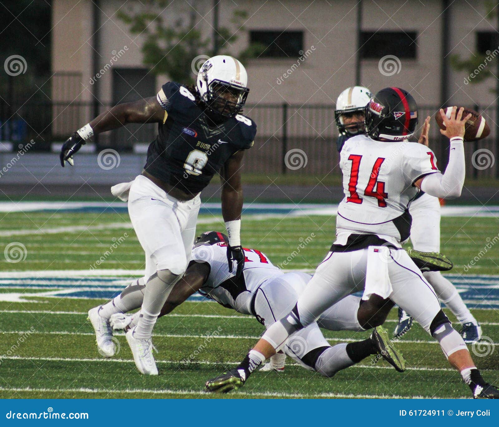 Pass Rush. editorial photo. Image of home, quarterback - 61724911