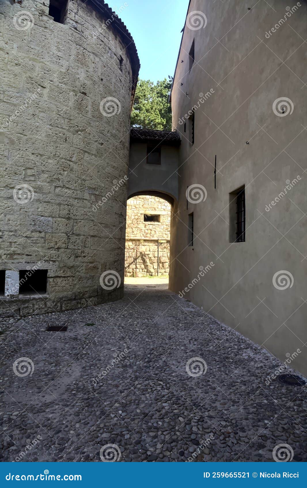 Passageway with an Arch between Two Buildings Stock Image - Image of ...