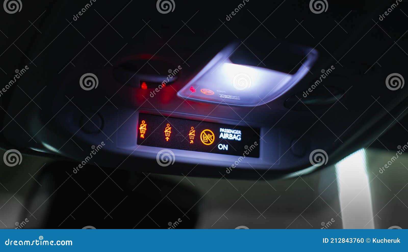 Passenger Airbag Status Warning Light on Display of a Car Console ...