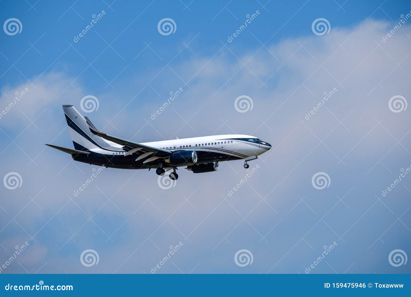 Passenger Airplane in the Blue Sky Stock Photo - Image of white, side ...