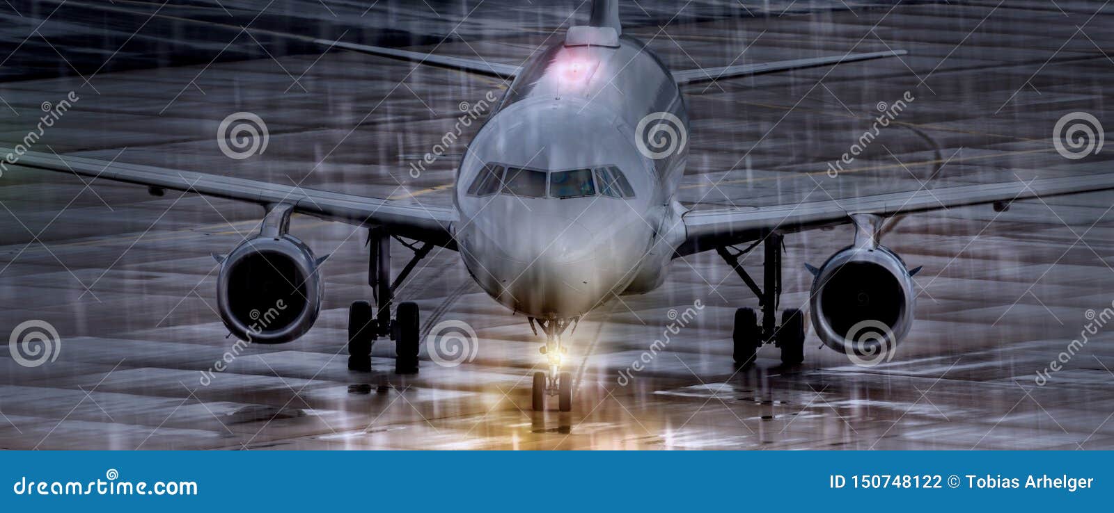 Passenger Airplane in the Evening in the Rain Stock Photo - Image of ...
