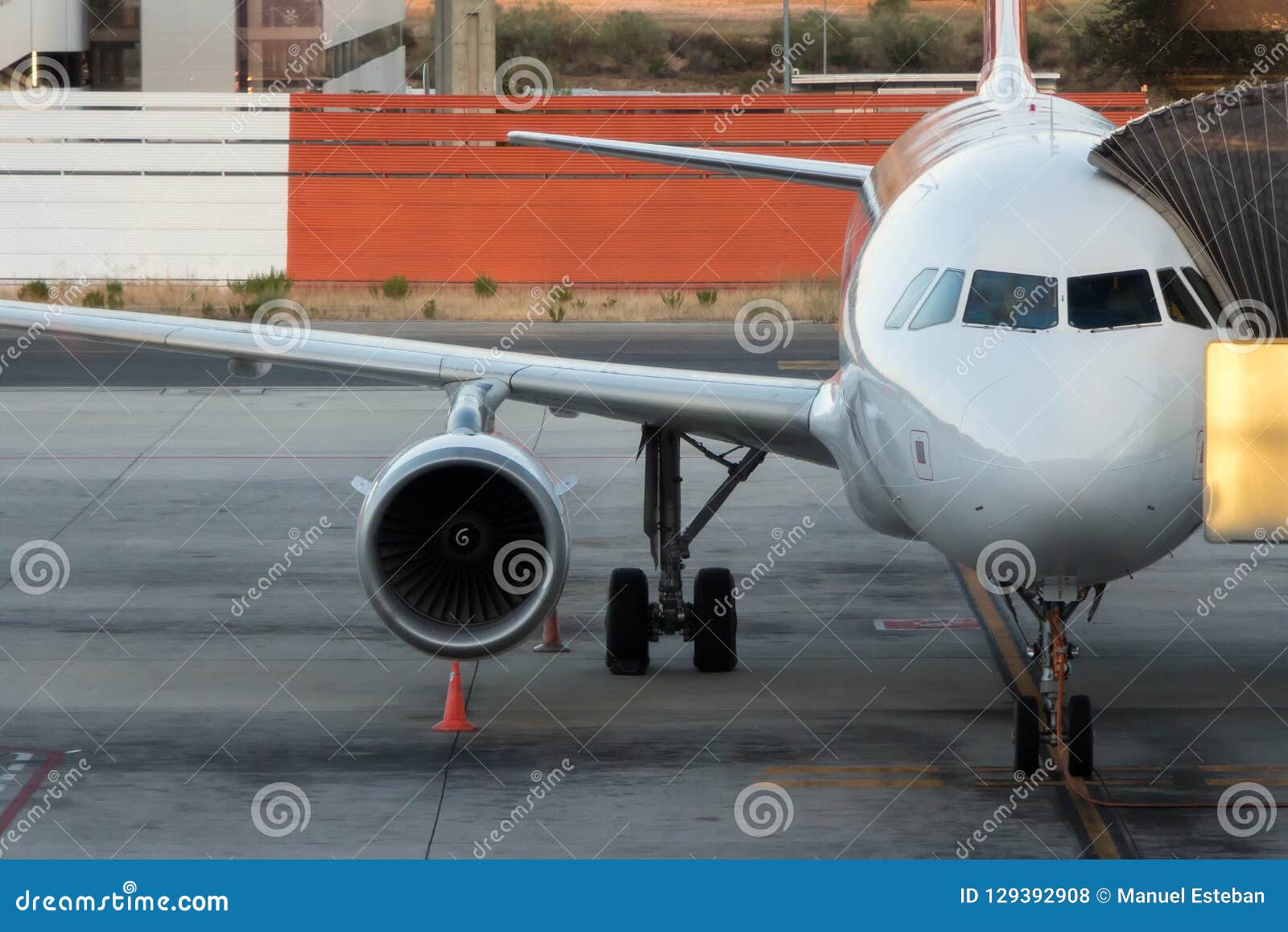 Passenger airplane parked stock photo. Image of commercial - 129392908