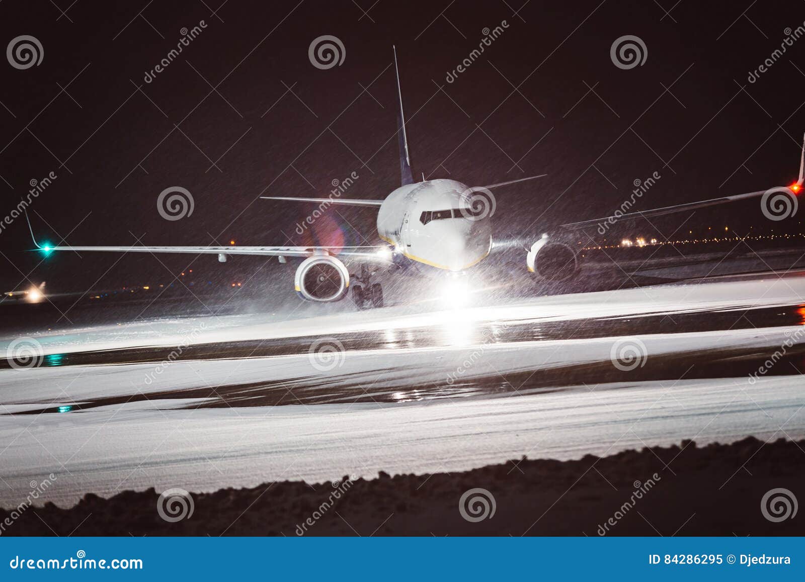 Passenger Airplane Takes Off during Heavy Snow Stock Image - Image of ...