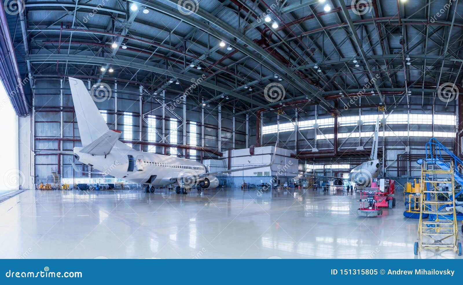 Passenger Aircrafts Under Maintenance. Checking Mechanical Systems for ...