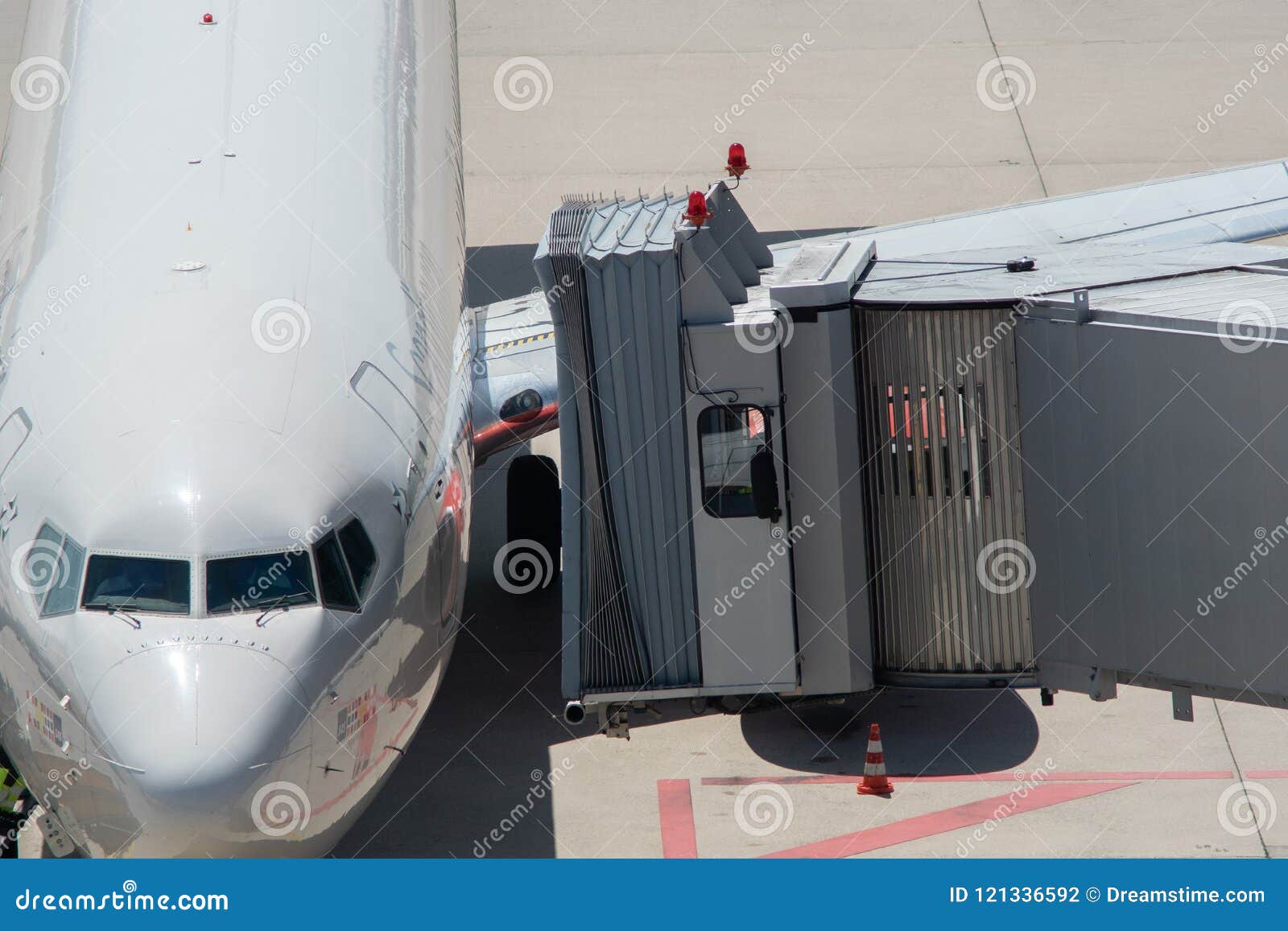 Passenger Boarding Bridge Docked on a Plane Editorial Photography ...