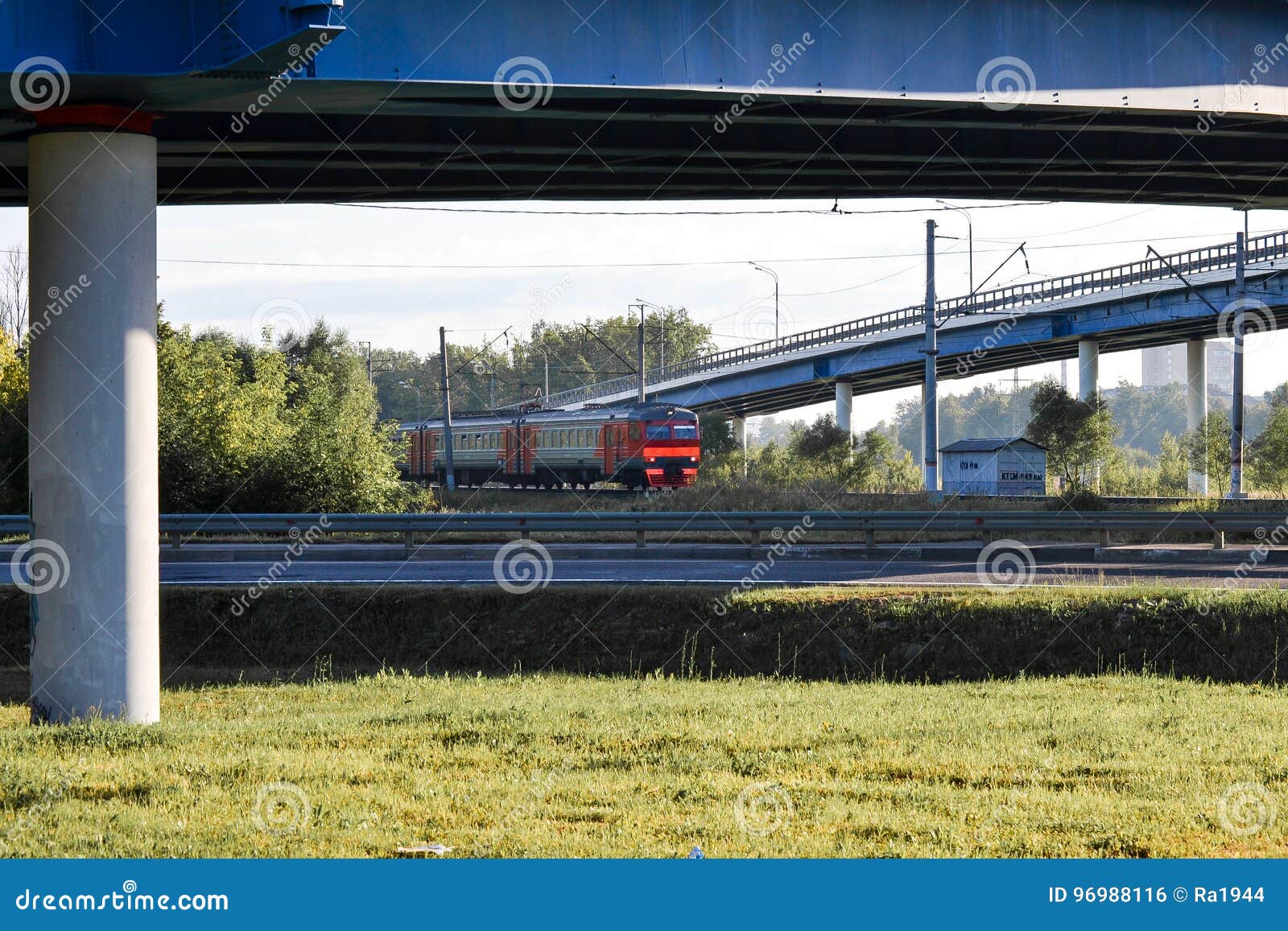 Passenger Commuter Train Under the Road Overpass Russia Stock Photo ...