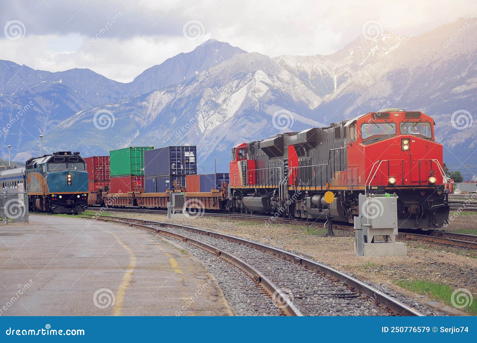 Passenger and Freight Container Train in Jasper. Alberta Editorial ...