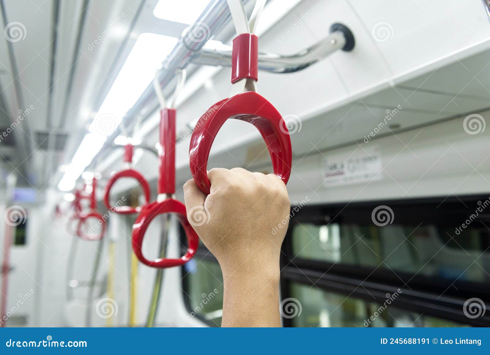 Passenger Hand Holding Handle on the Train Stock Image - Image of ...