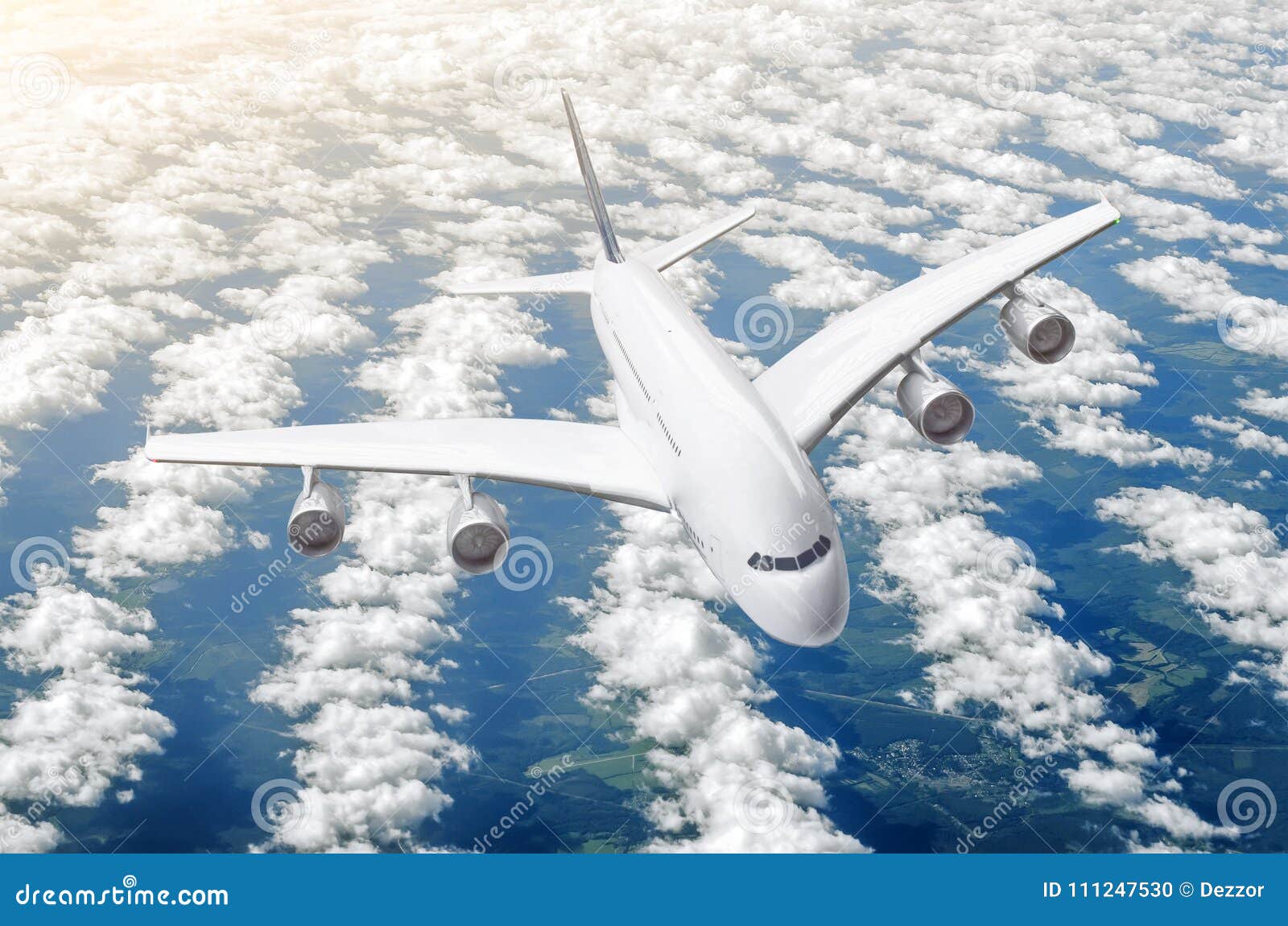 Passenger Huge Liner Plane Fly on a Fly Above Clouds and Blue Sky ...