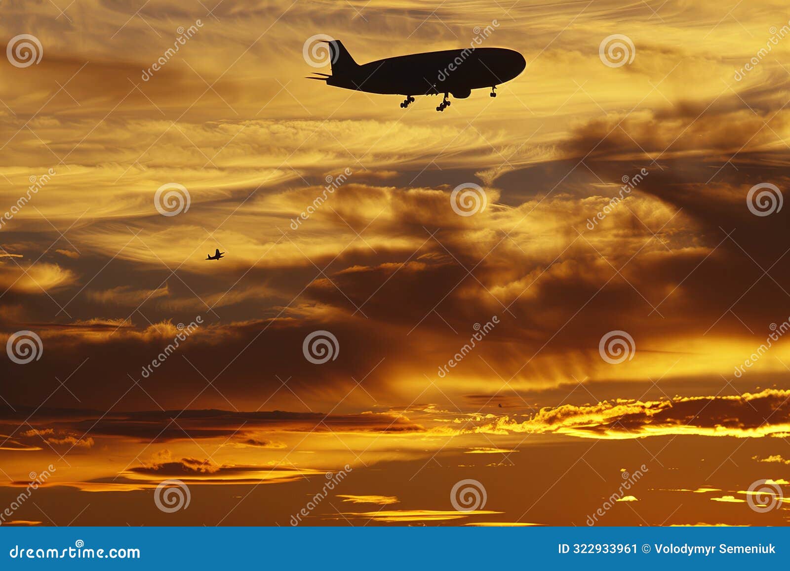 Passenger Jet Descending through Golden Sunset Clouds Stock ...