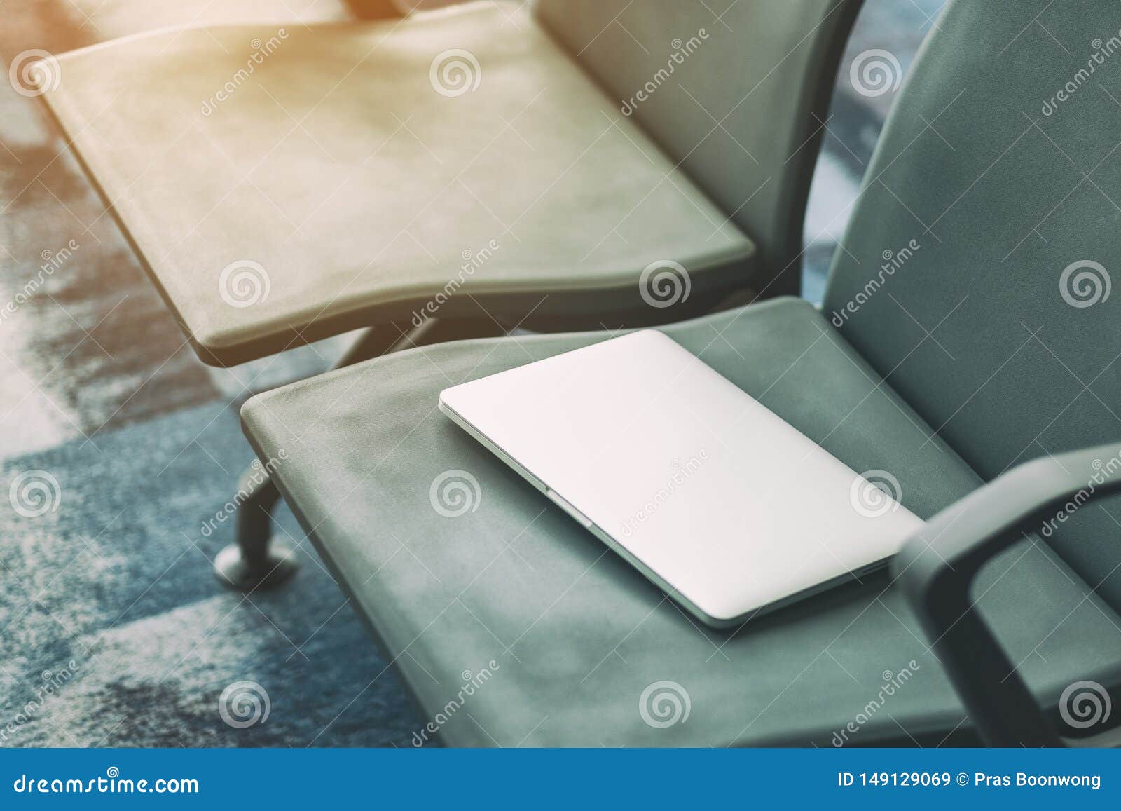 Lost Laptop Computer on the Airport Chair Stock Image - Image of ...