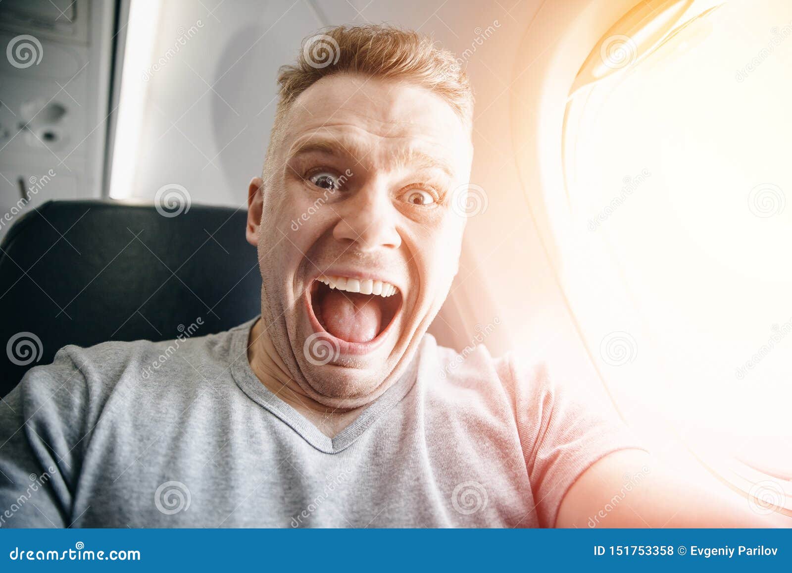 Passenger Man in Plane Clutches His Head, Afraid of Heights and Flight ...