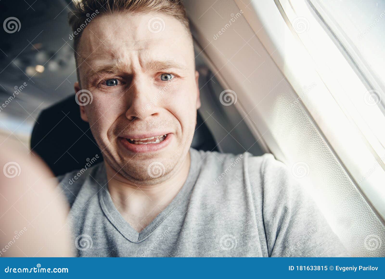 Passenger Man in Plane Clutches His Head, Afraid of Heights and Flight ...