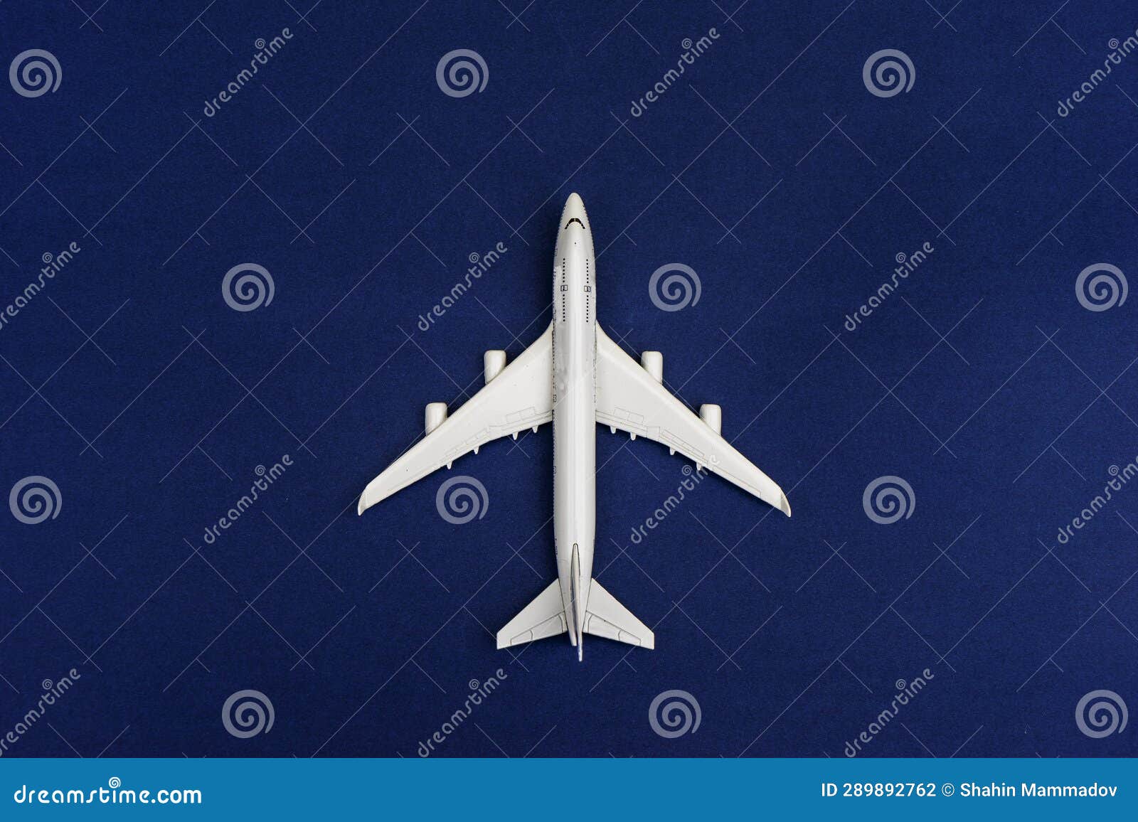 Passenger Model Airplane on a Blue Background. Free Space for Text ...