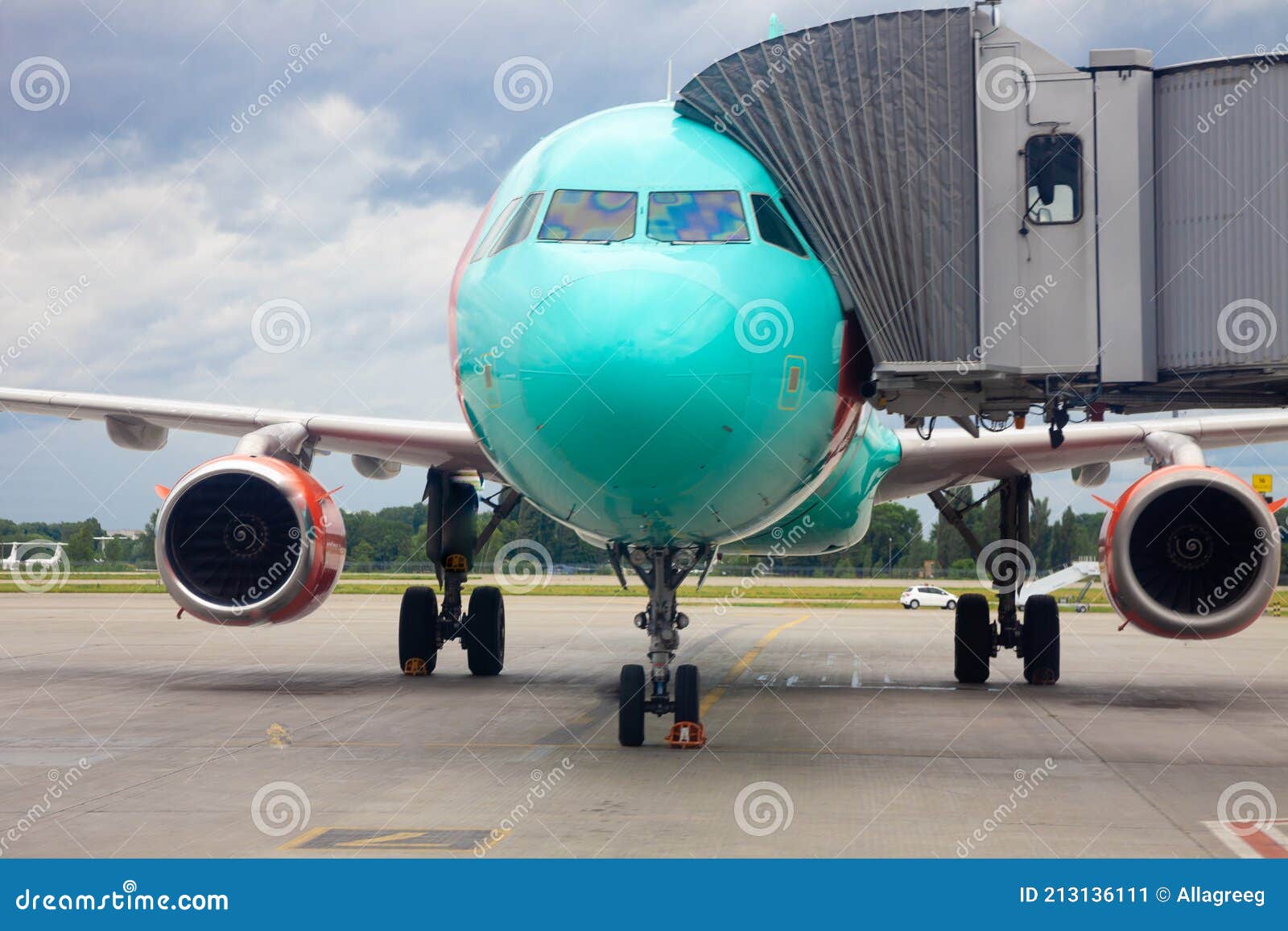 Passenger Plane at the Airport. Boarding Passengers through the ...