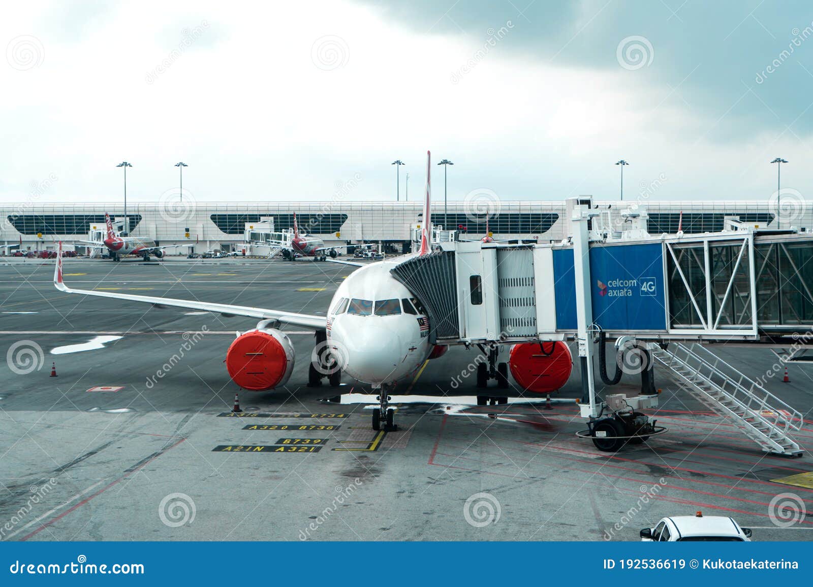 Passenger Plane Boarding Passengers by Jet Bridge Editorial Stock Image ...
