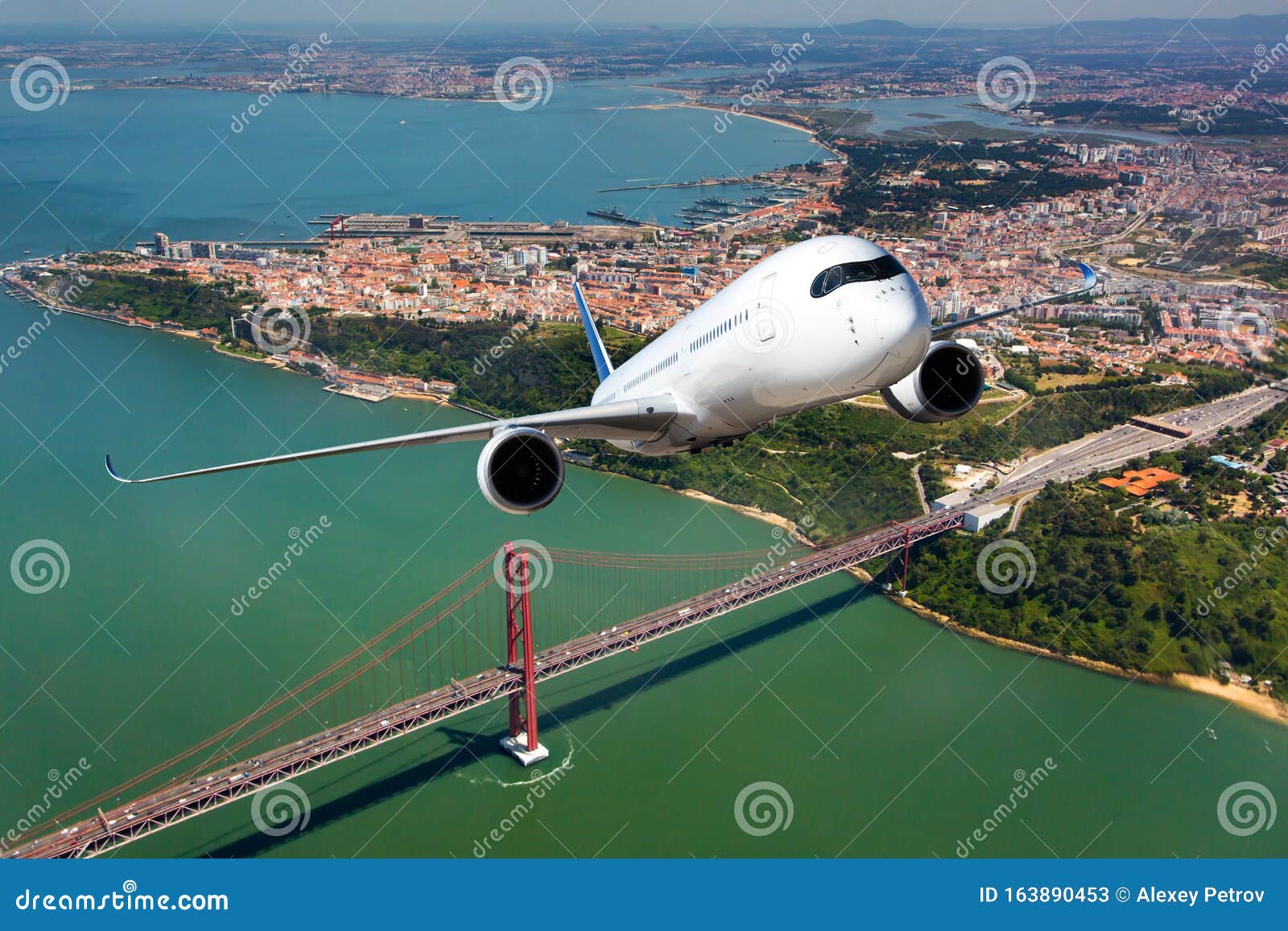 Passenger Plane Flies Above the Cable-stayed Bridge and River Stock ...
