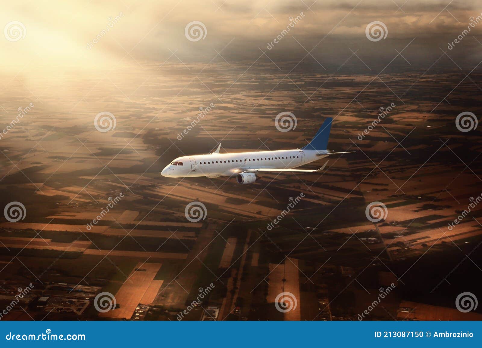 Passenger Plane Flies Over Fields on a Sunny Day Stock Photo - Image of ...