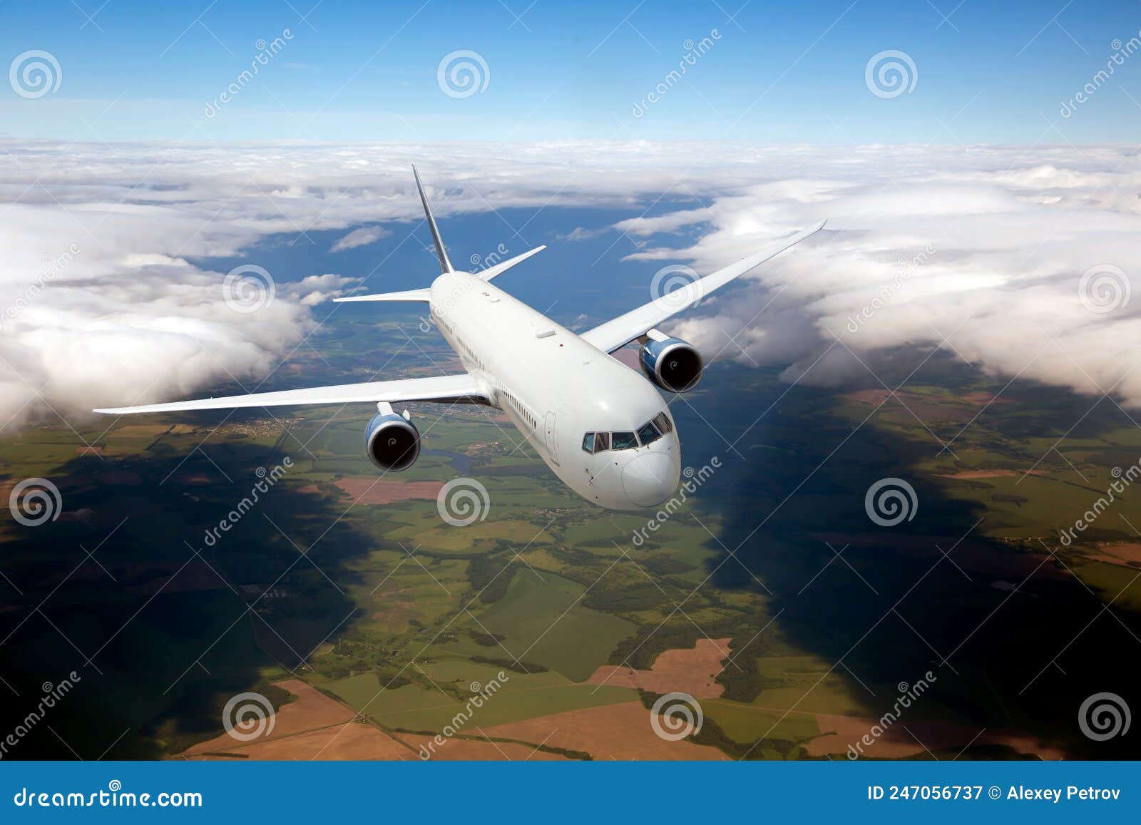 Passenger Plane in Flight. Aircraft Fly Above Green Plain. Left Heeling ...