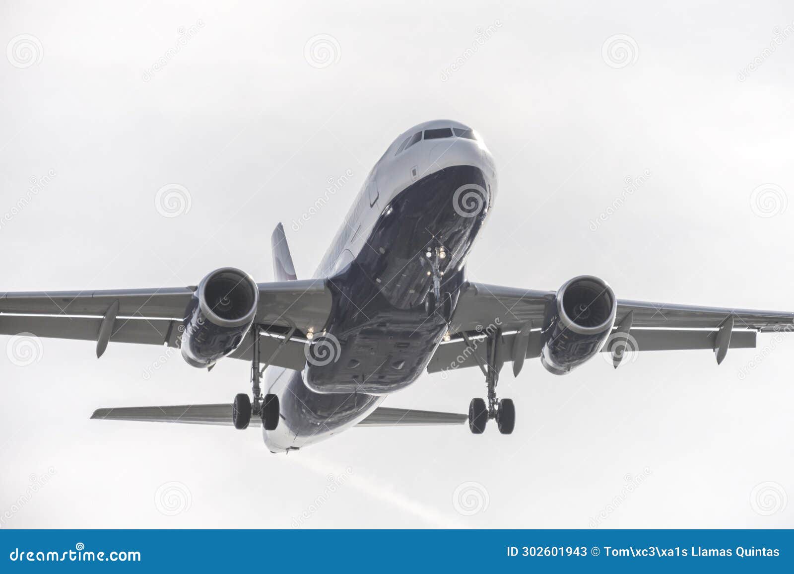 A Passenger Plane with Landing Gear Deployed and Flaps Lowered Stock ...