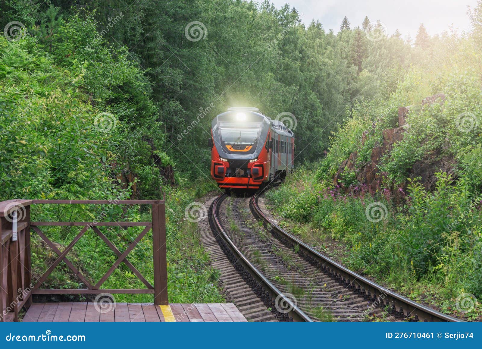 Passenger Train Approaches To the Wooden Platform. Stock Image - Image ...