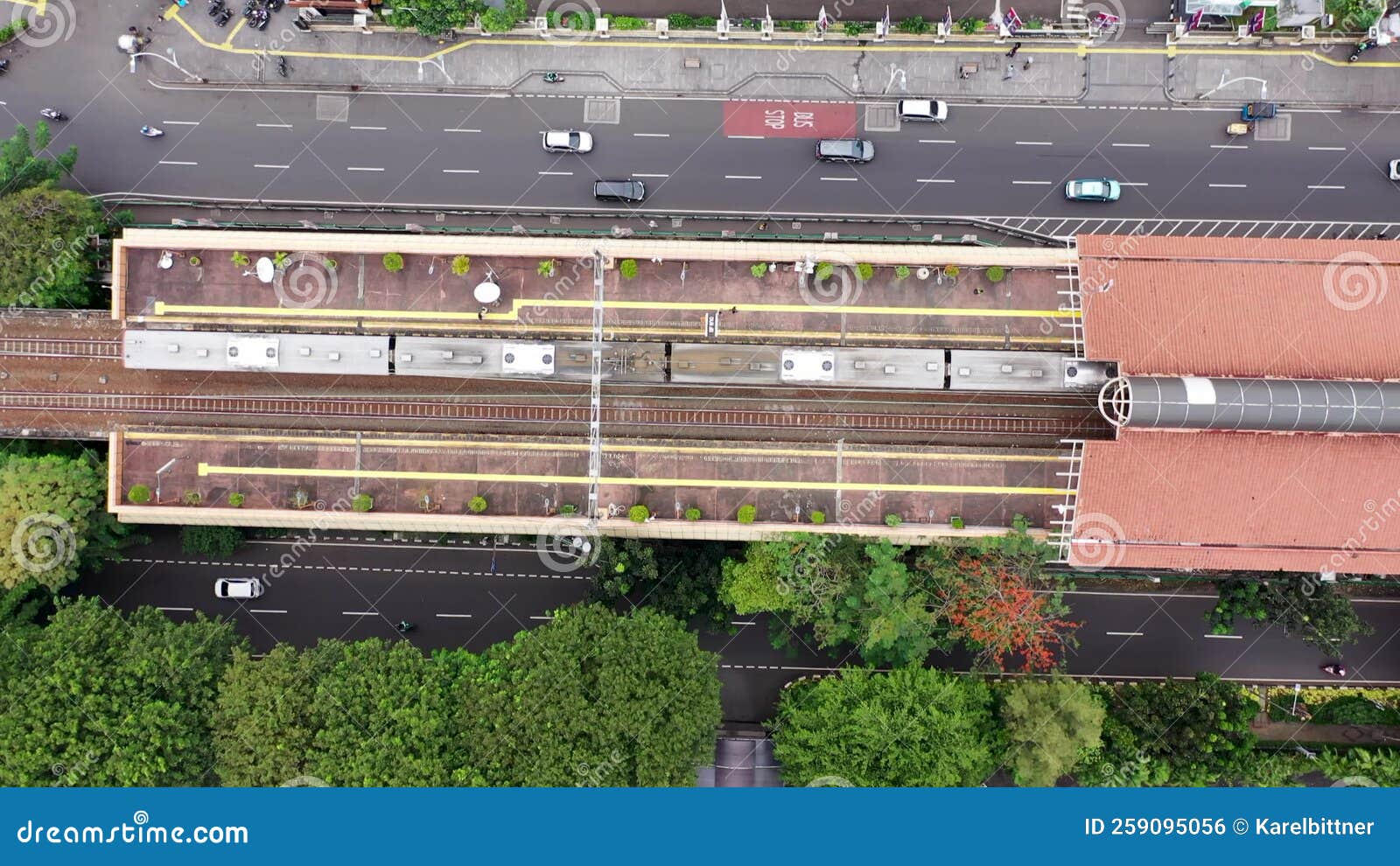 Passenger Train Arriving and Stopping at the Platform, Top Down Aerial ...