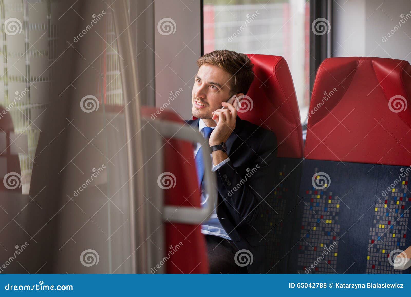 Passenger on Train with Cellphone Stock Photo - Image of young, train ...