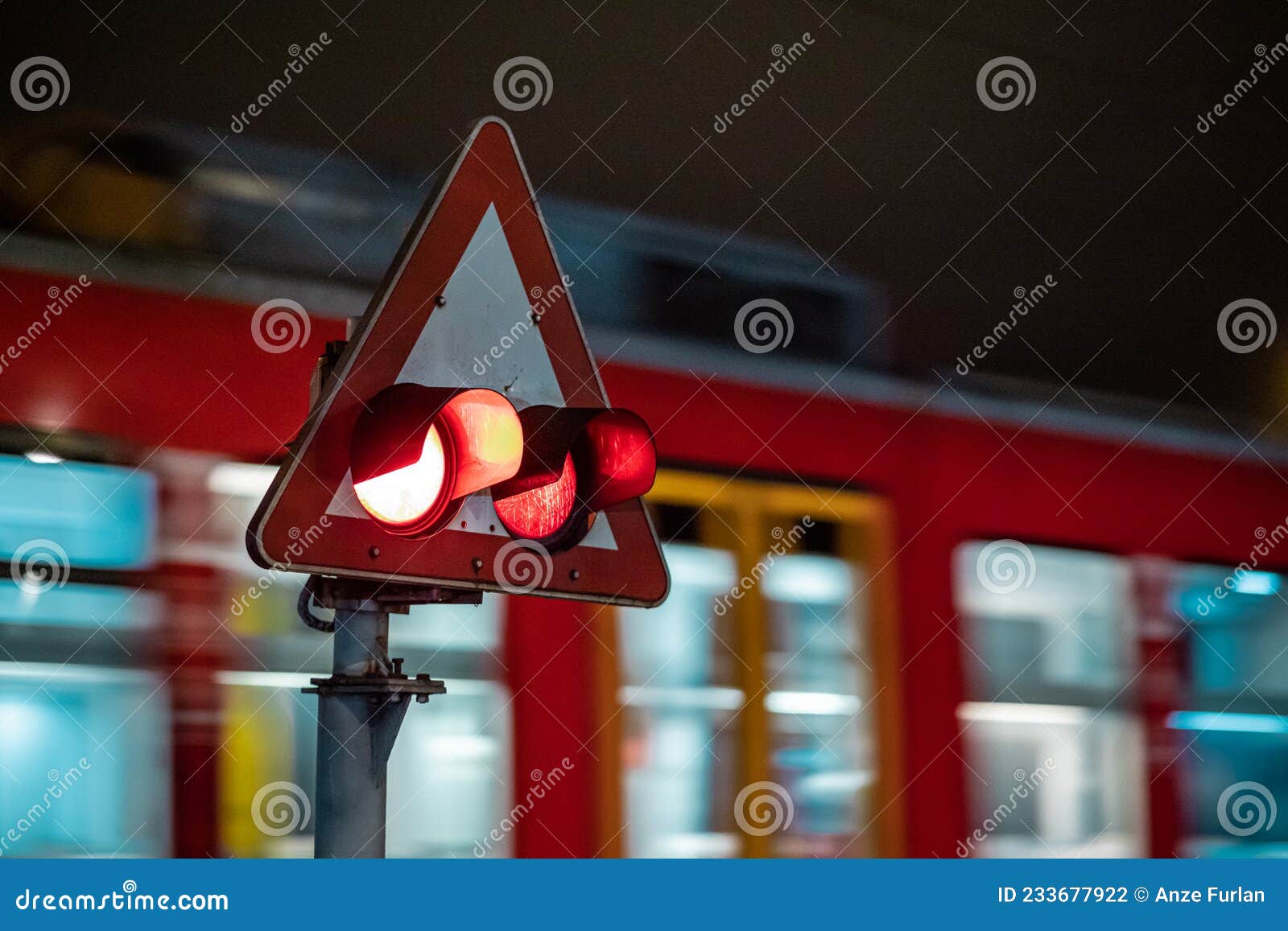 Passenger Train Rushing Past the Stop Signal Warning at Night. Night ...