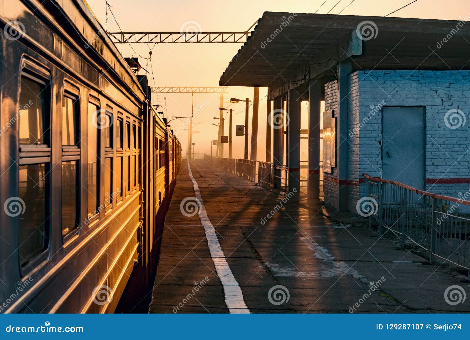Passenger Train Stands by the Platform. Stock Image - Image of dusk ...