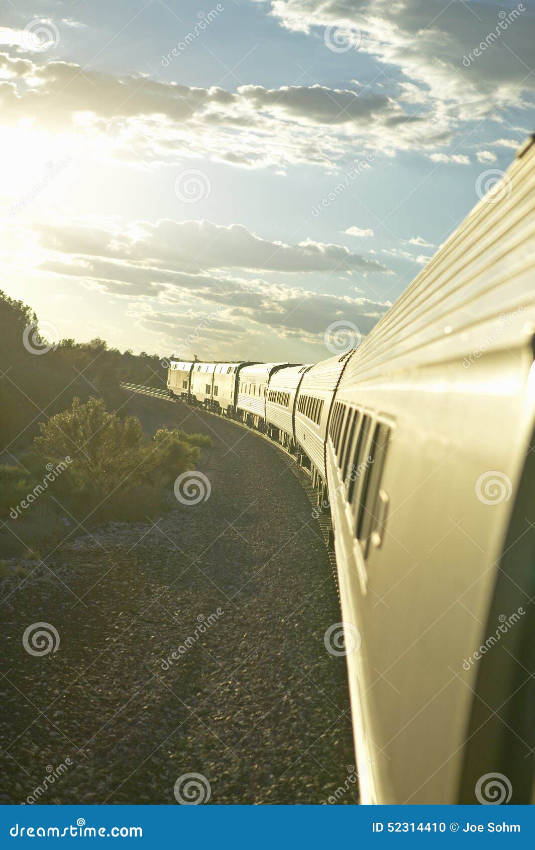 Passenger Train Traveling into the Arizona Sunset Stock Photo - Image ...