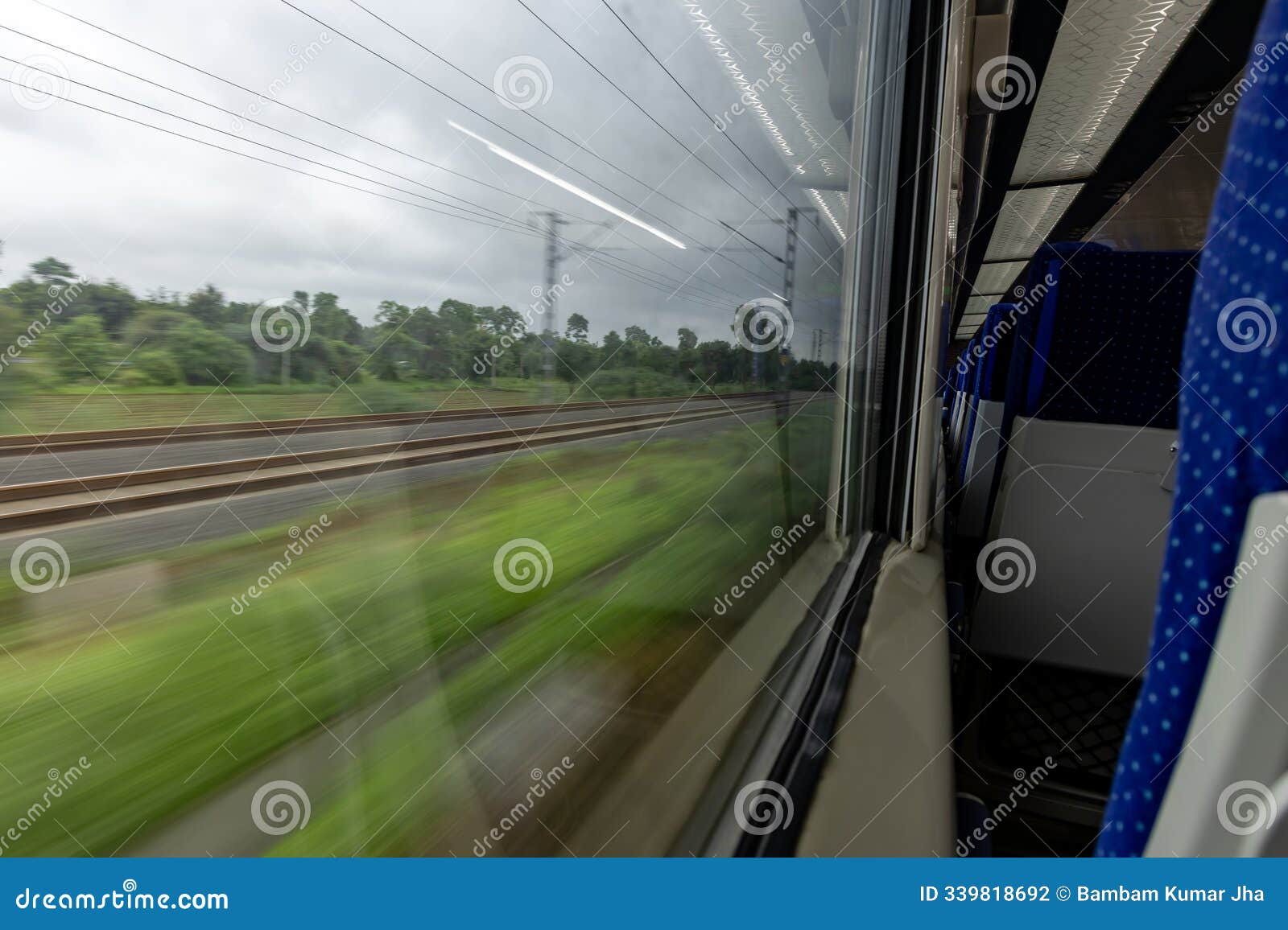 Passenger Train Window View during Daytime with Motion Blur Stock Photo ...