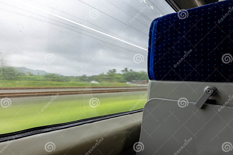 Passenger Train Window View during Daytime with Motion Blur Stock Photo ...