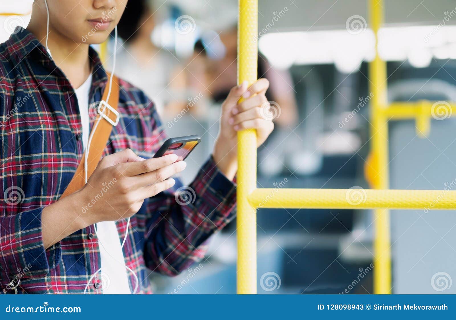 The Passenger Using Mobile Phone on the Public Bus. Stock Image - Image ...