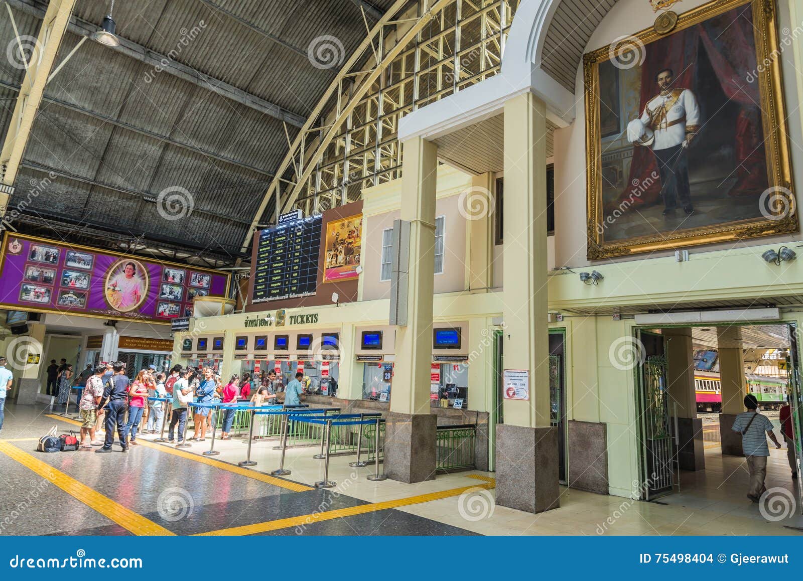 Passenger Wait at the Queue for Buy Train Ticket in Train Station ...