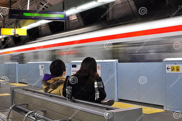 Passenger Waiting for Fast Train Editorial Photo - Image of commute ...