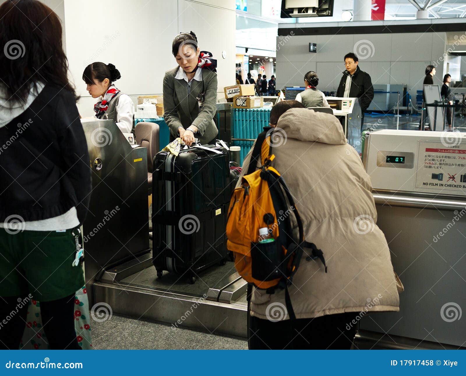 Passengers At The Airport. Checking Baggage. A Man With A Suitcase ...