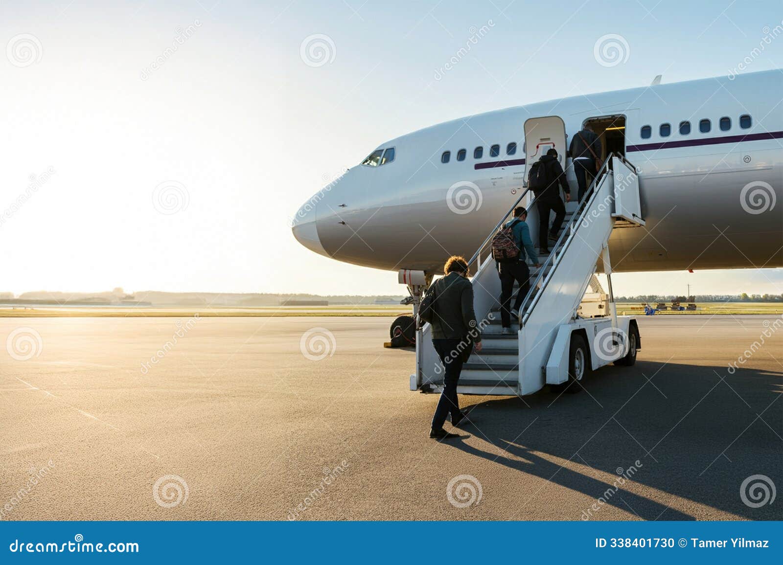 Passengers Boarding the Aircraft from the Stairs of a Passenger ... Passengers Boarding the Aircraft from the Stairs of a Passenger ...
