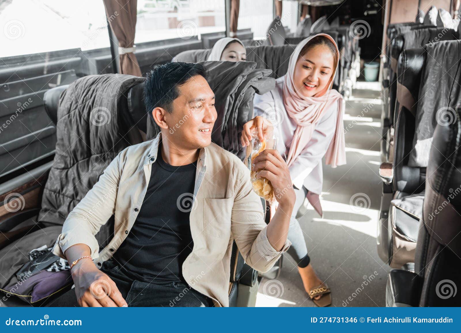 Passengers Sharing Snacks with Other while Road Trip on the Bus Stock ...