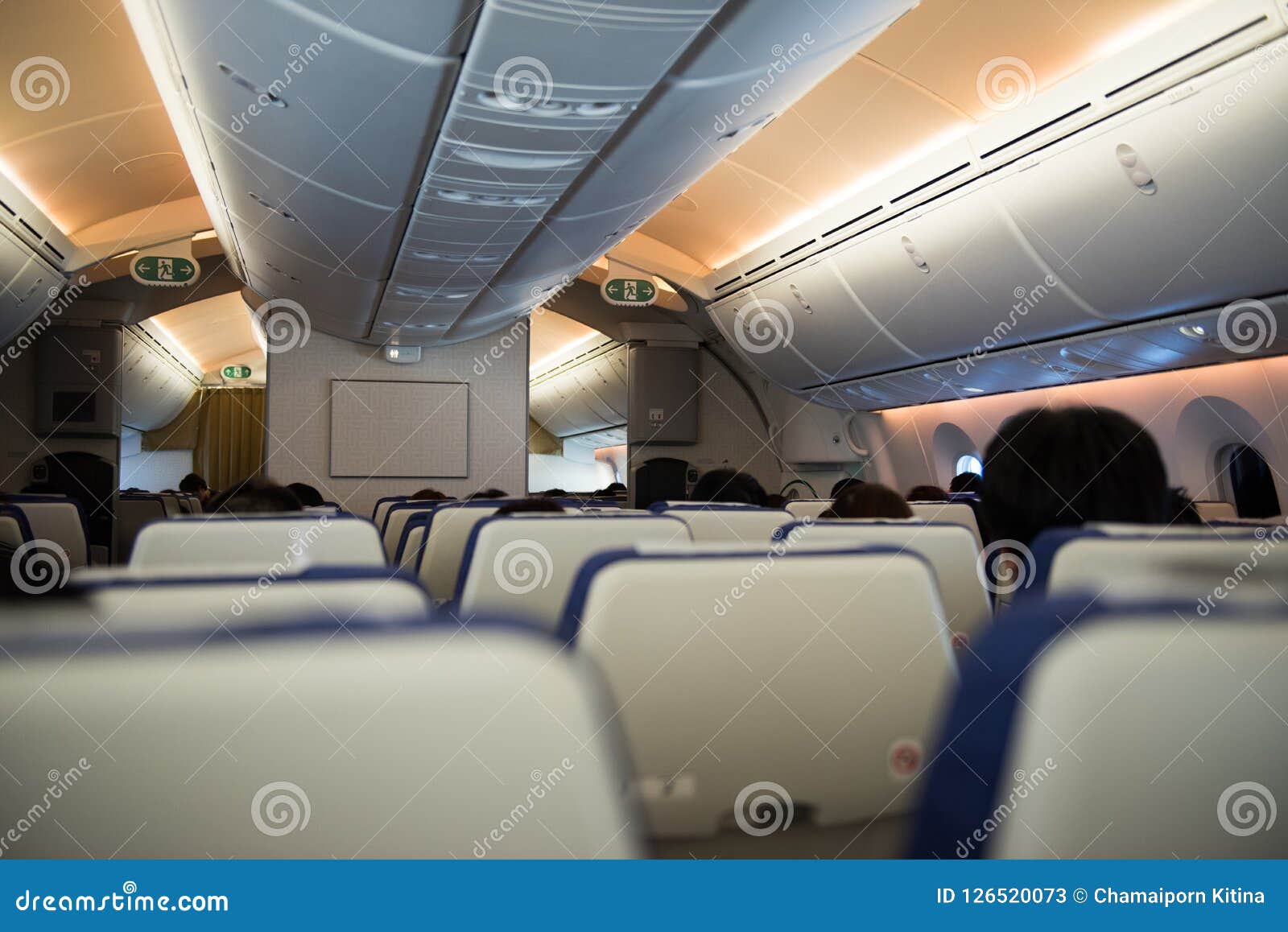 Passengers Sit in Flight during Travel Abroad in Airplane. Stock Image ...