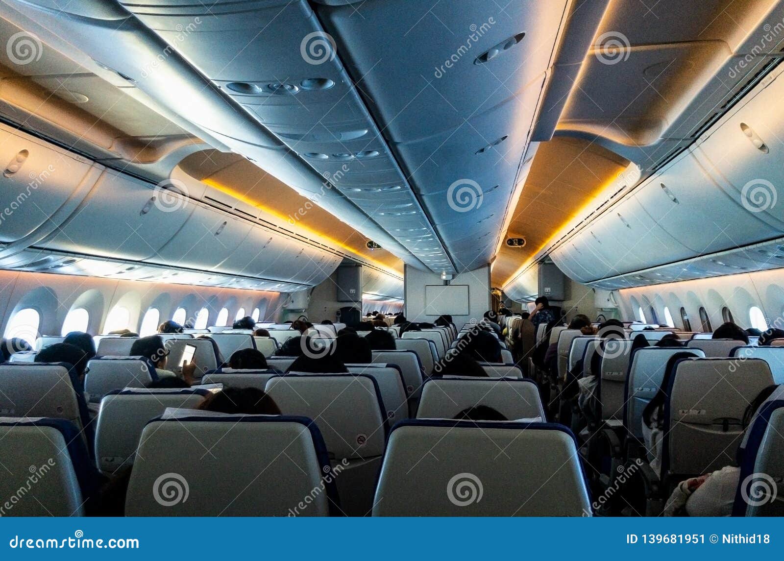 Passengers Traveling by Plane. Stock Image - Image of board, inside ...