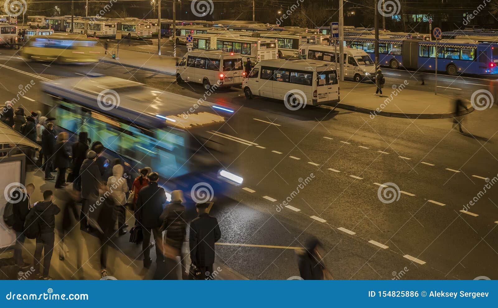 Passengers Waiting and Boarding Buses at the Bus Terminal Editorial ...