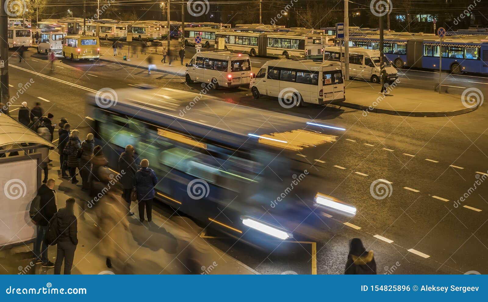 Passengers Waiting and Boarding Buses at the Bus Terminal Editorial ...