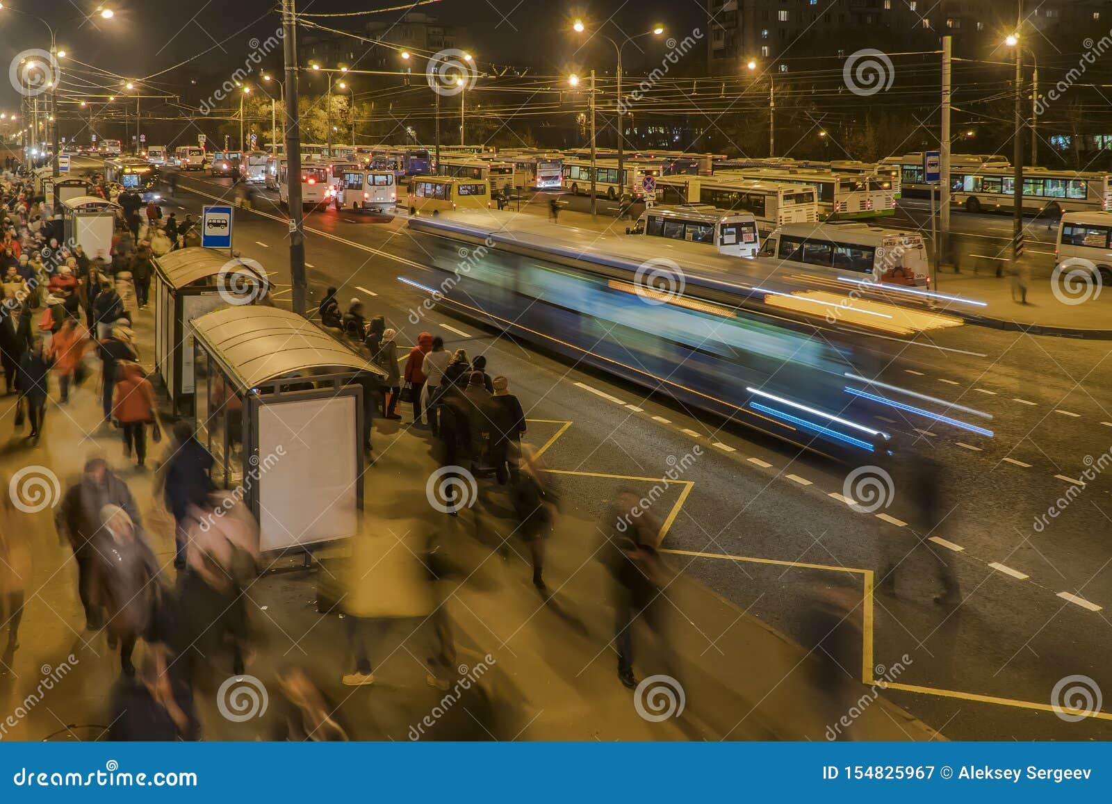 Passengers Waiting and Boarding Buses at the Bus Terminal Editorial ...