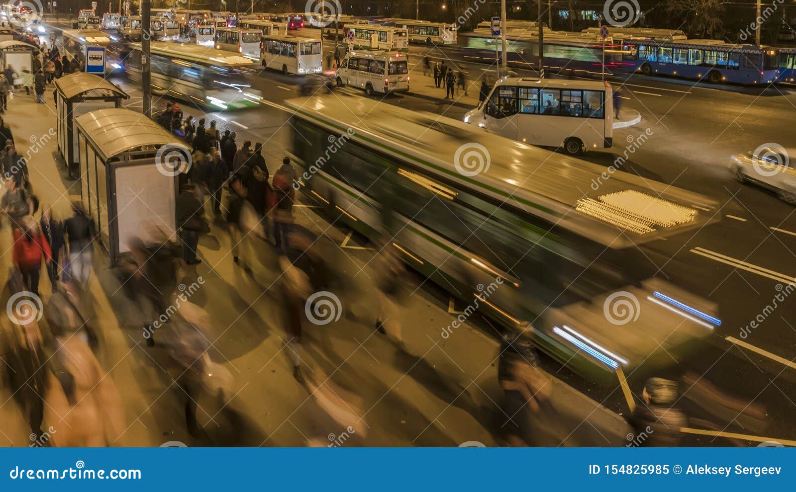 Passengers Waiting and Boarding Buses at the Bus Terminal Editorial ...