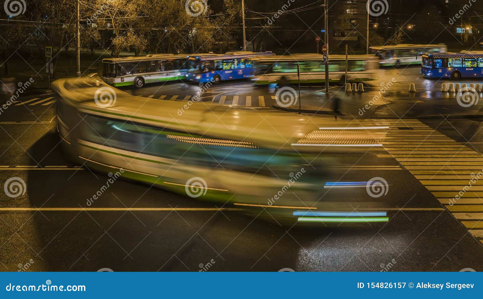 Passengers Waiting and Boarding Buses at the Bus Terminal Stock Image ...