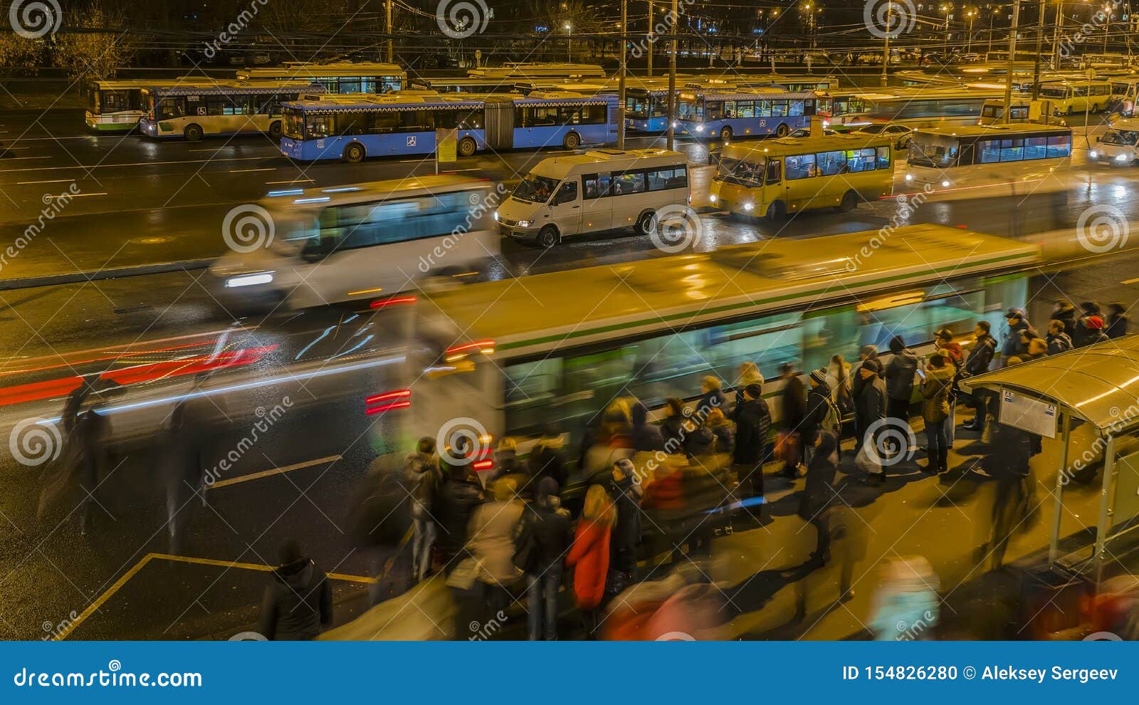 Passengers Waiting and Boarding Buses at the Bus Terminal Editorial ...