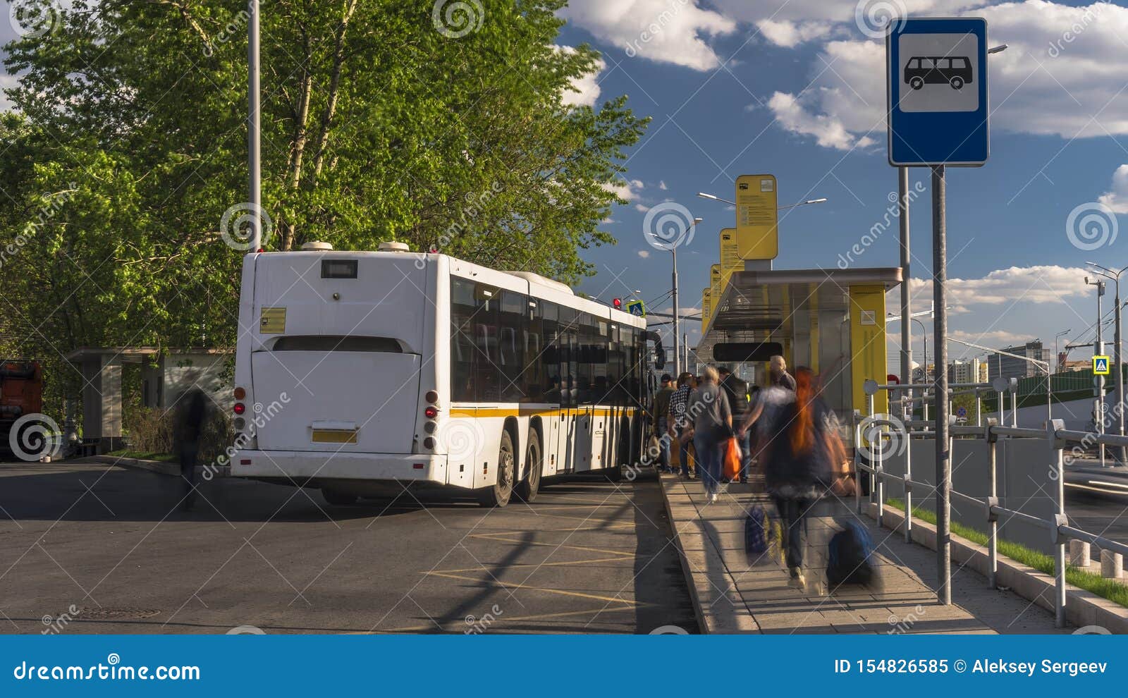 Passengers Waiting and Boarding Buses at the Bus Terminal Editorial ...