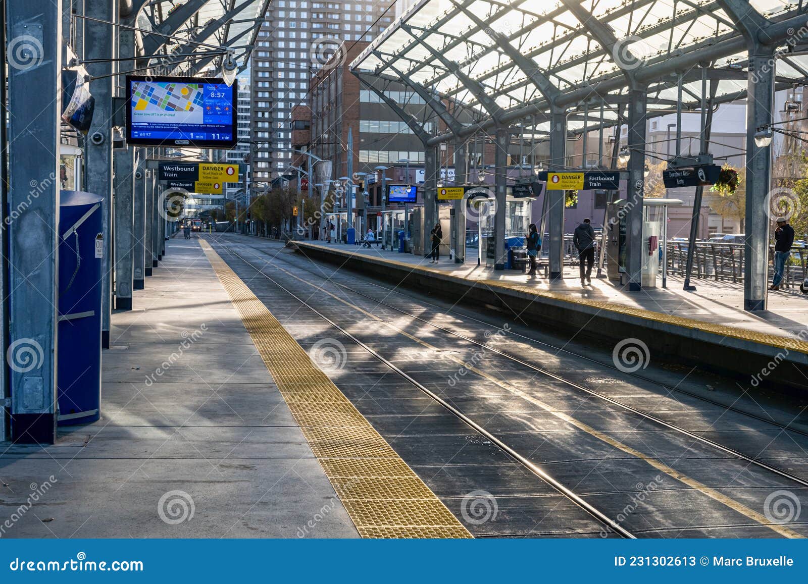 Passengers Waiting for the Calgary Transit Tram at a Station in ...