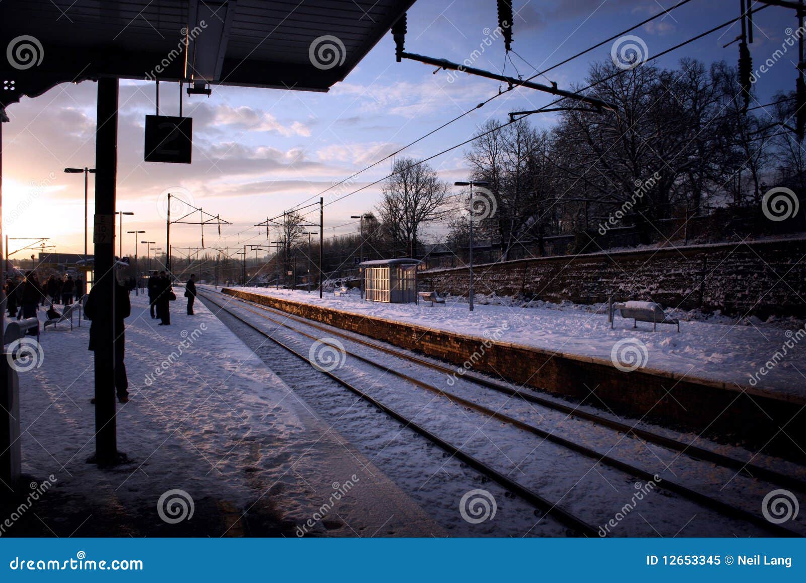 Passengers Waiting on Snow Covered Platform Stock Image - Image of rush ...