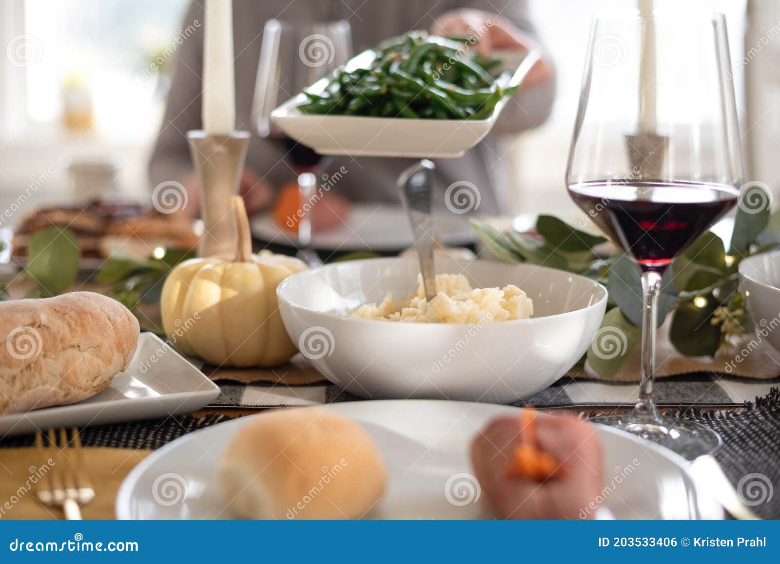 Passing Food Across the Table at a Holiday Meal Stock Photo - Image of ...